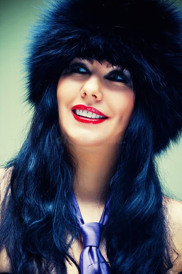 Woman in blue fur hat stock image. Image of beauty, stares - 7928991