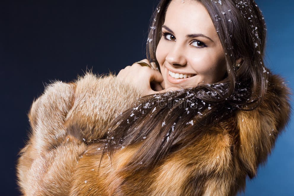 Woman in a fur coat stock image. Image of flirt, body - 15395257