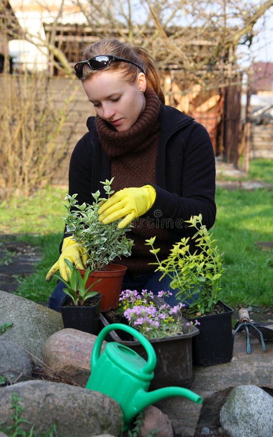 Woman in garden stock photo. Image of beauty, garden, ornamenta - 5054818