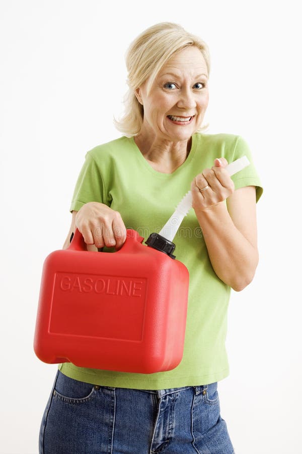 Woman with gas can. stock photo. Image of indoors, person - 6153400