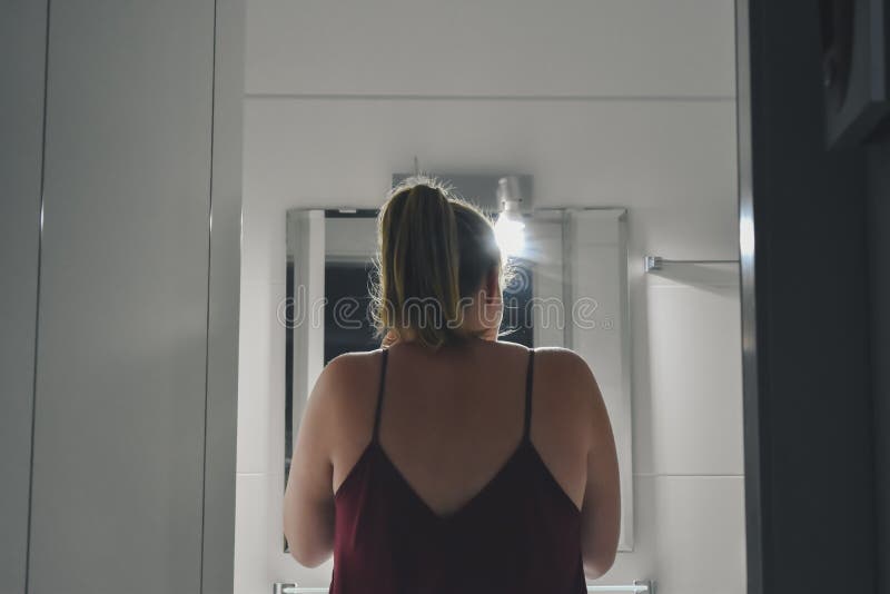 Woman Getting Beautiful in Front of a Mirror Stock Image - Image of ...