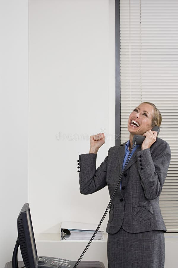 Woman getting good news stock image. Image of computers - 62560257