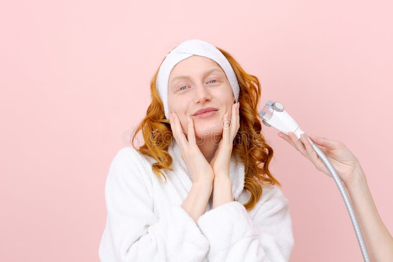 A Woman is Getting Her Face Done with a Device Stock Photo - Image of ...