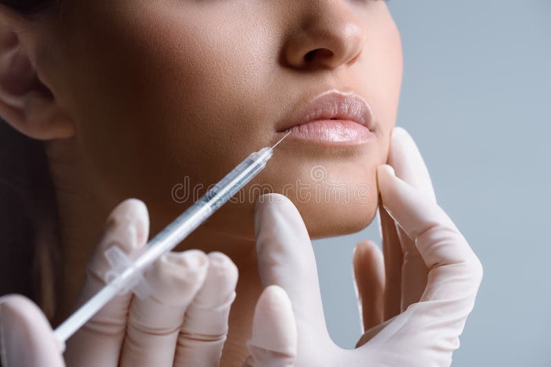 Woman getting injection stock photo. Image of woman - 109813542
