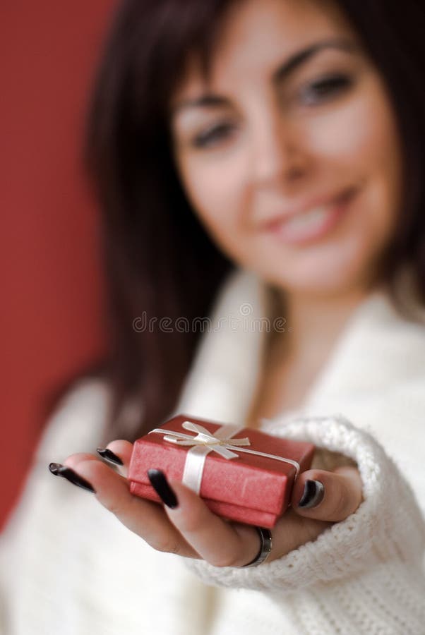 Woman with gift stock image. Image of celebration, hand - 11710493