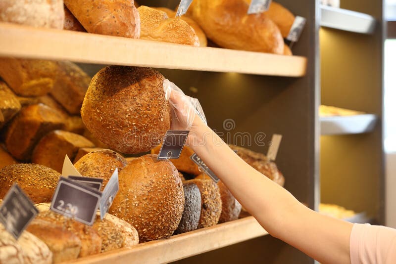 Woman Gives Bread To the Customer in Bakery Stock Image - Image of ...