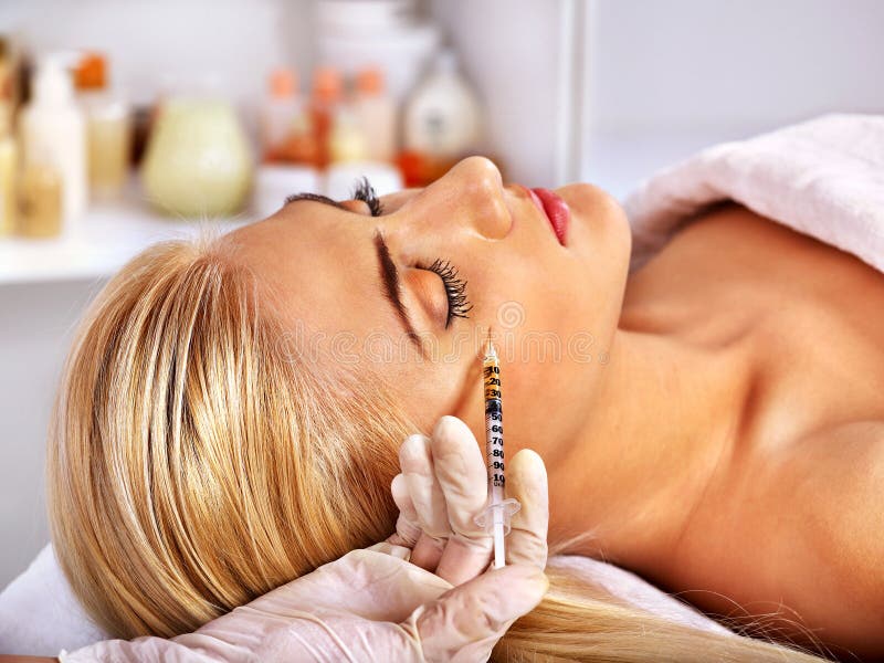 Woman Giving Botox Injections. Stock Photo - Image of beautician ...