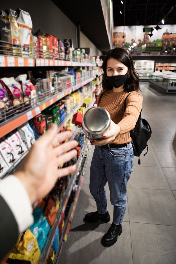 Woman Giving Can with Tea at Grocery Store Stock Image - Image of mall ...