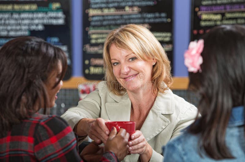 Female Bartender Serving Coffee To Woman Stock Image - Image of coffee ...