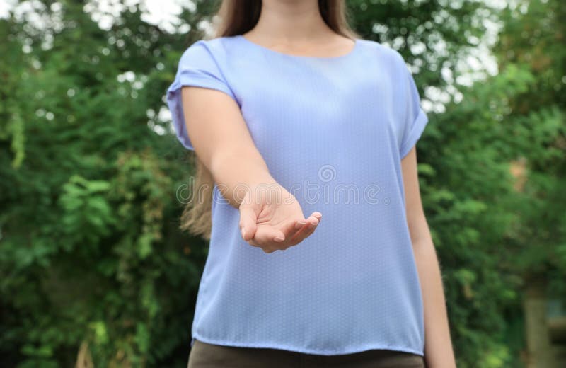 Woman giving helping hand stock photo. Image of gesture - 129693640