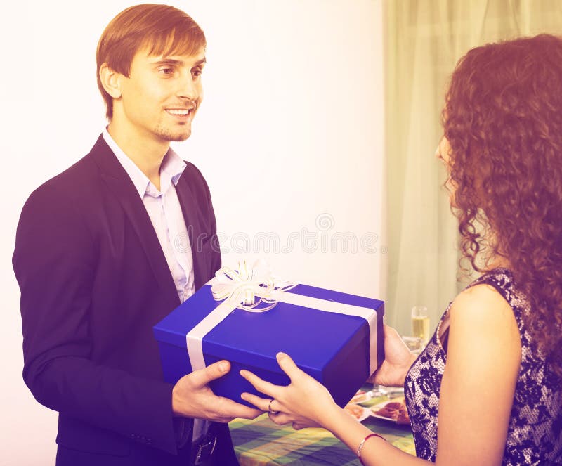 Woman Giving Present To Man Stock Photo - Image of female, girl: 94044438