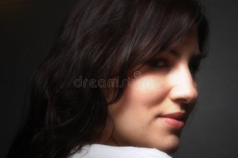 Woman Glancing at the Camera Stock Image - Image of headshot, sideways ...