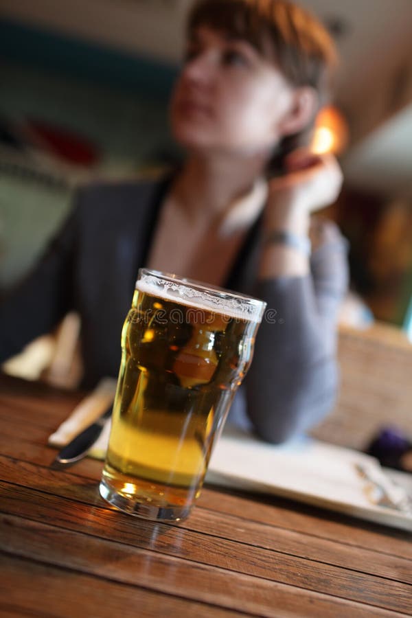 Woman with glass of beer stock photo. Image of cafe, female - 30613742