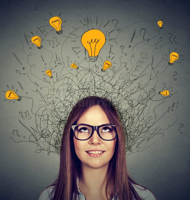 Woman In Glasses With Many Ideas Light Bulbs Above Head Looking Up