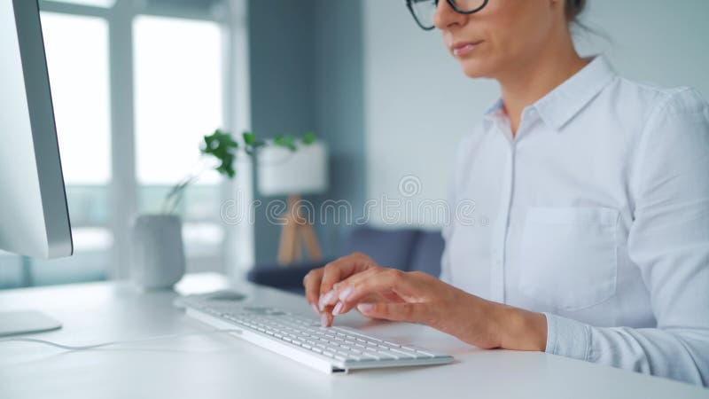 Woman in Glasses Typing on a Computer Keyboard. Concept of Remote Work ...