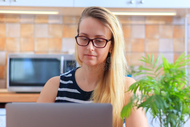 Woman in Glasses Using Laptop Computer Stock Photo - Image of connected ...