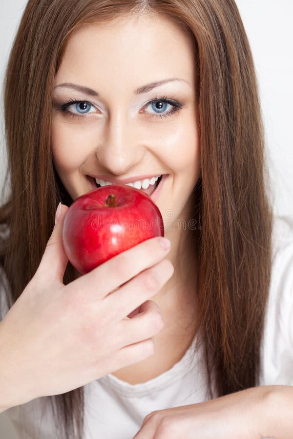 Young woman and apple stock photo. Image of girls, breasted - 1660048