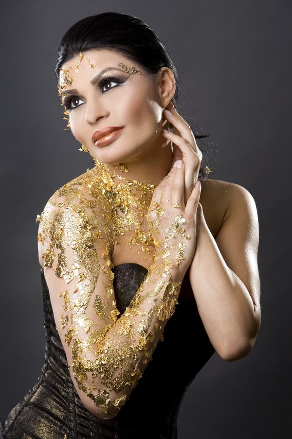 Woman in gold stock image. Image of lips, glamorous, closeup - 11233375