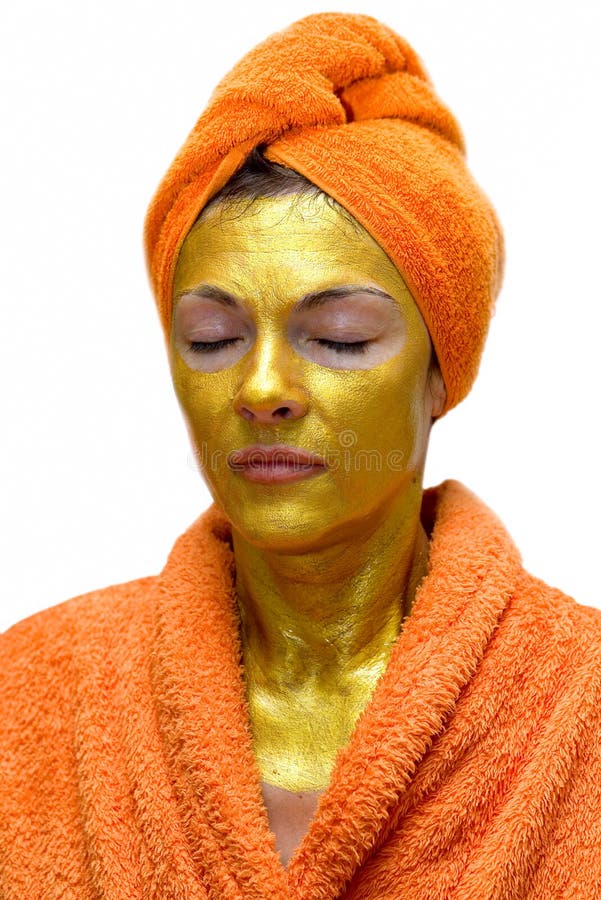Woman with gold face mask stock image. Image of golden - 12099351