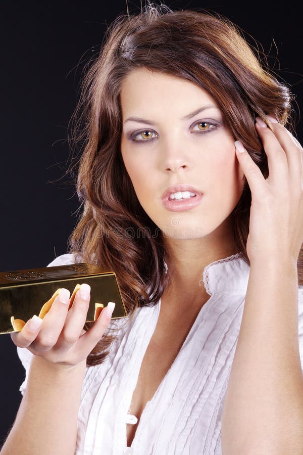 Woman and gold ingots stock photo. Image of look, beautiful - 39184996