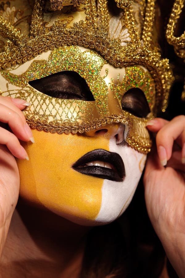 Woman in golden half mask stock photo. Image of erotic - 15584522