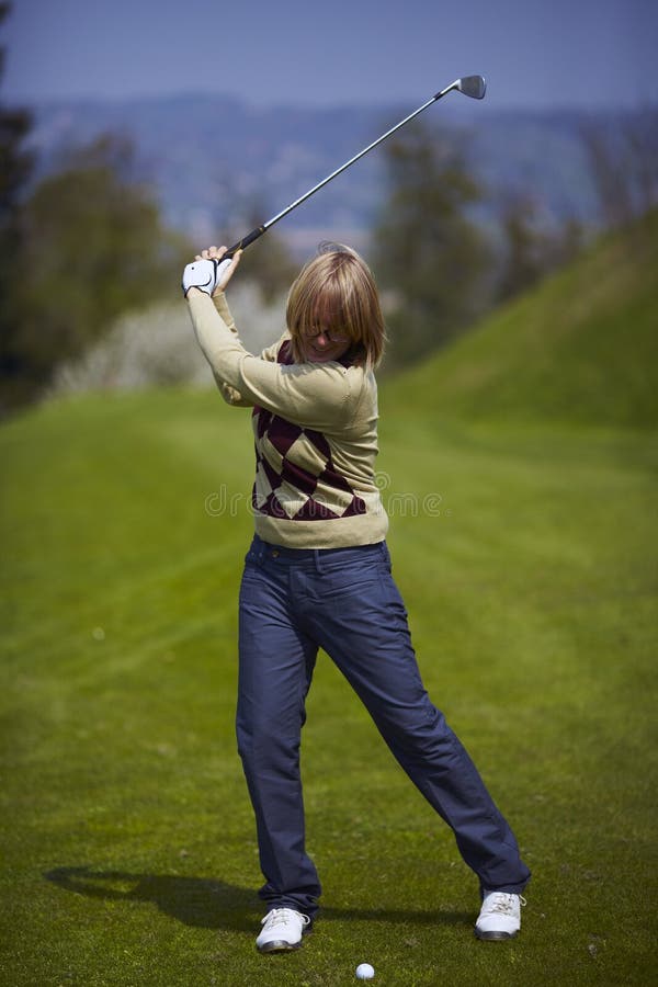 Woman on the Golf Course Preparing for a Swing Stock Image - Image of ...