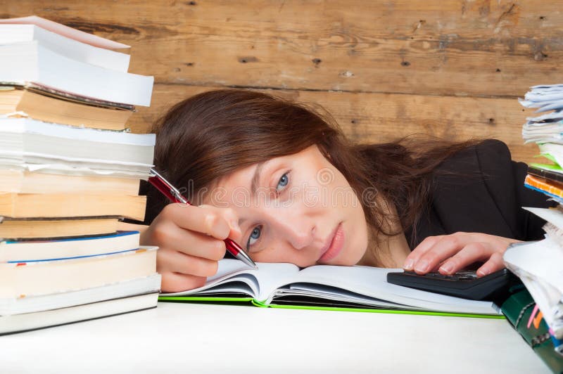 Woman Got Tired of Working and Studying Next To the Stack of Pap Stock ...