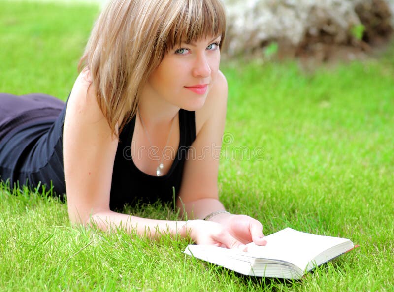 Lovely Girl Reading the Book Stock Image - Image of cute, exam: 25467175