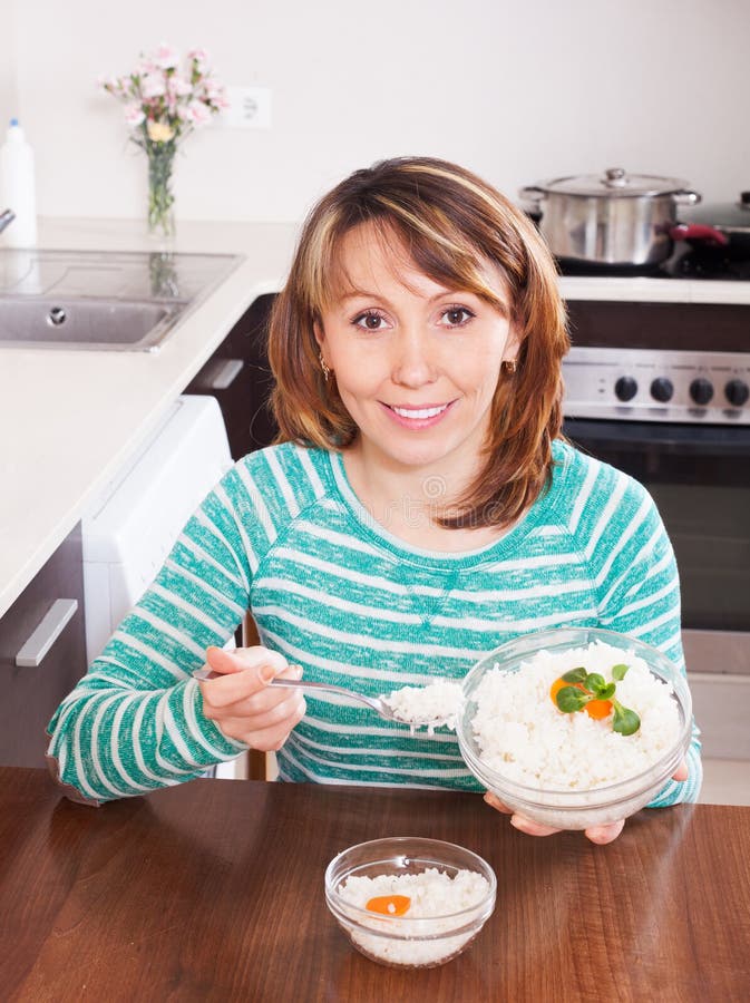 Woman in Green Eating Boiled Rice Stock Photo - Image of boiled, girl ...