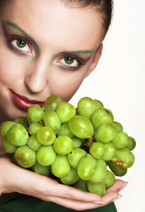 Woman with green grape stock image. Image of grapes, food - 55292913