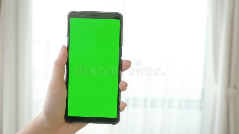 Woman with green screen stock image. Image of hand, cellphone - 106570435