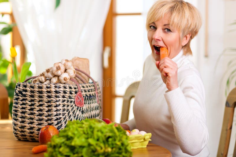 Carrot eating sideways stock image. Image of healthy - 12183847