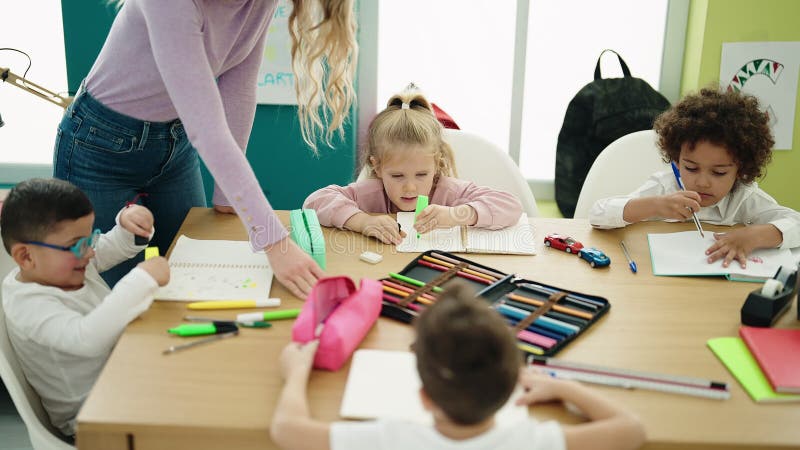Woman and Group of Kids Having Lesson Clapping Hands at Classroom Stock ...