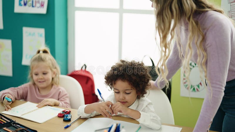 Woman and Group of Kids Having Lesson Clapping Hands at Classroom Stock ...