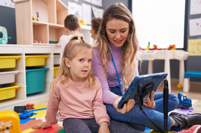 Woman and Group of Kids Having Lesson Using Touchpad at Kindergarten ...