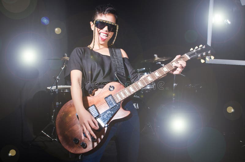 Woman guitar player stock photo. Image of party, melody - 31039604