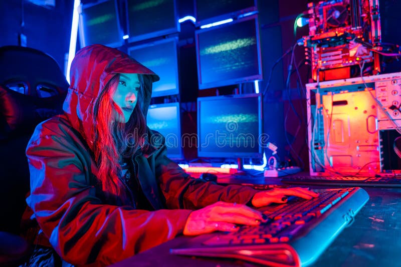 Woman Hacker Asian Woman Wearing Hood Is Typing Keyboard For Coding