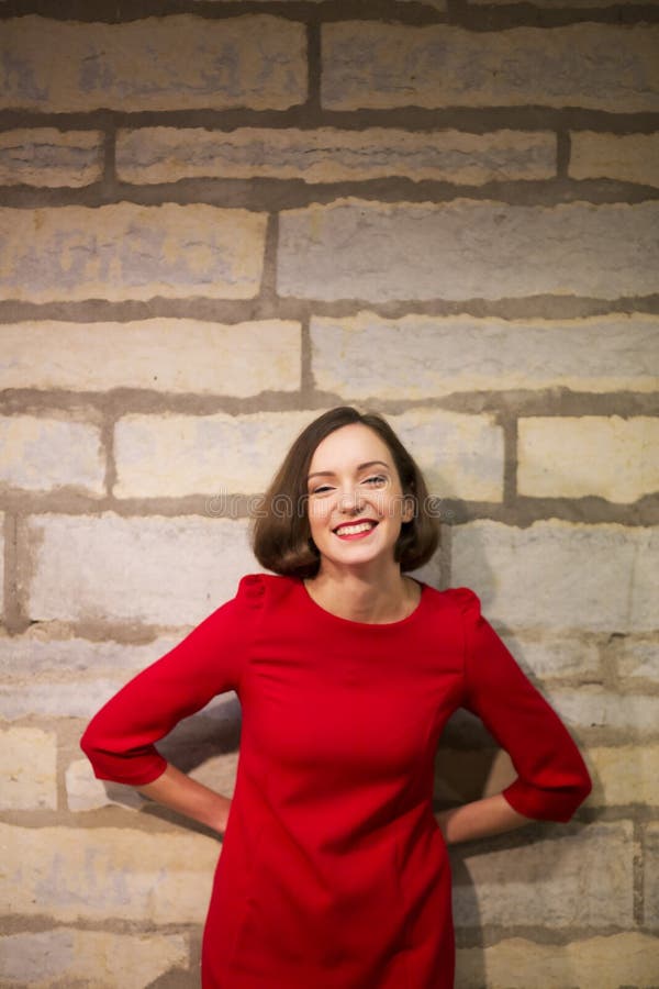 Woman Hallway Holding Hands Behind Body Stock Photos - Free & Royalty ...