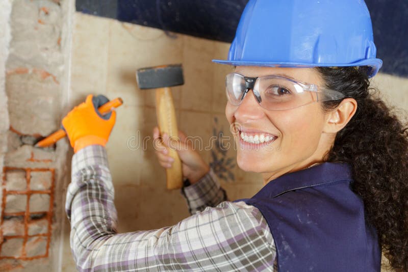Woman with Hammer and Chisel Stock Photo - Image of hard, break: 246348740