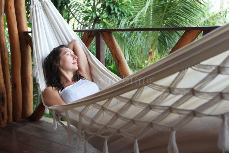 Woman in a hammock stock photo. Image of environment - 37170002