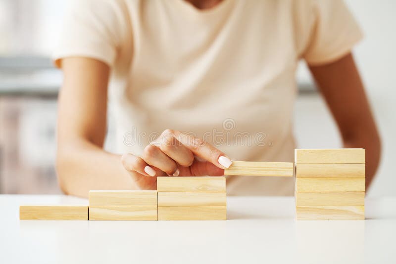 Woman Hand Arranging Wood Cube Stacking As Stair Step Shape Stock Photo ...