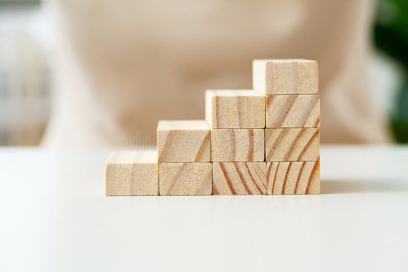 Woman Hand Arranging Wood Cube Stacking As Stair Step Shape Stock Photo ...