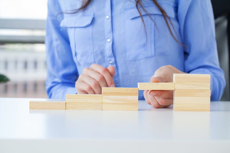 Woman Hand Arranging Wood Cube Stacking As Stair Step Shape Stock Photo ...
