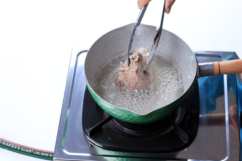 Woman Hand Boiled Beef on the Pan Stock Photo - Image of heat ...