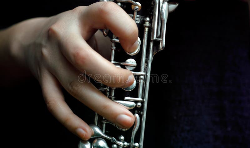 Playing at clarinet stock image. Image of hands, clarinetist - 38116339