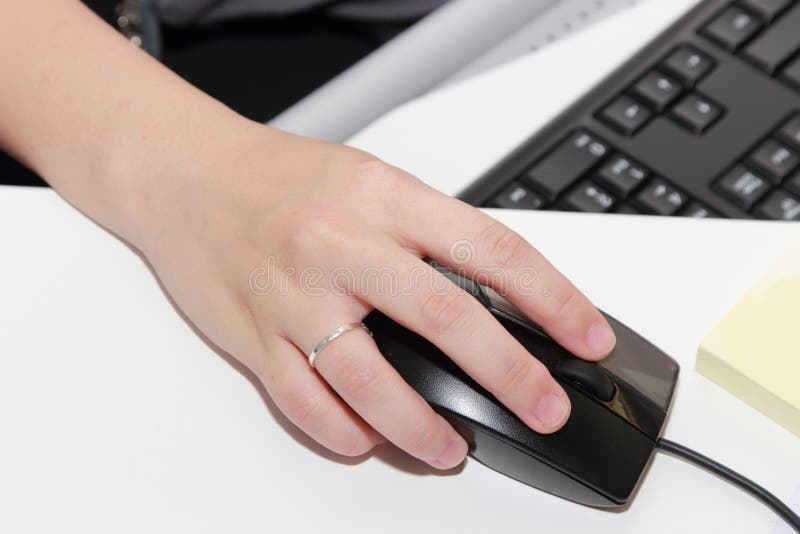 Woman hand click the mouse stock photo. Image of industry - 28871246