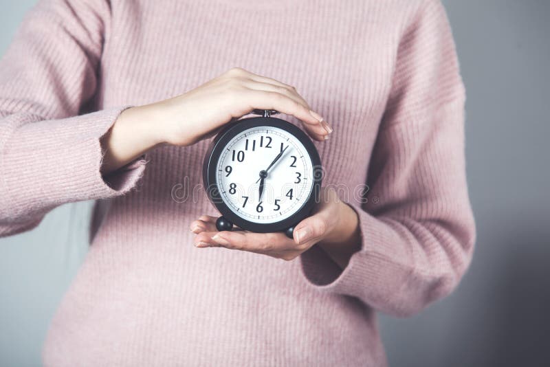 Woman hand clock stock photo. Image of retro, people - 174134824
