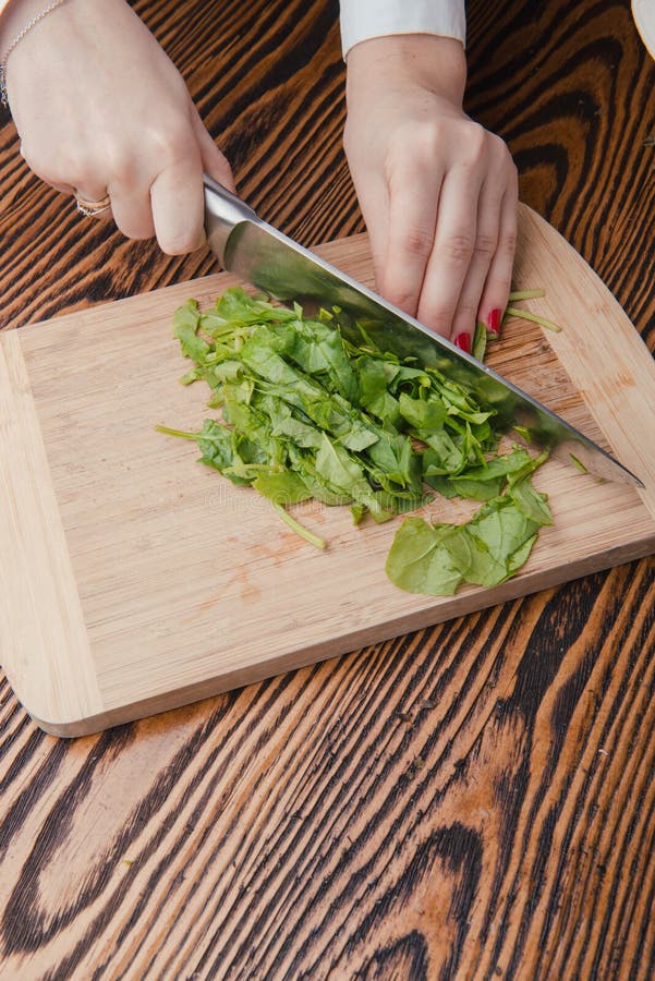 Woman Hand Cutting Spinach Using a Sharped Big Kitchen Knife Stock ...