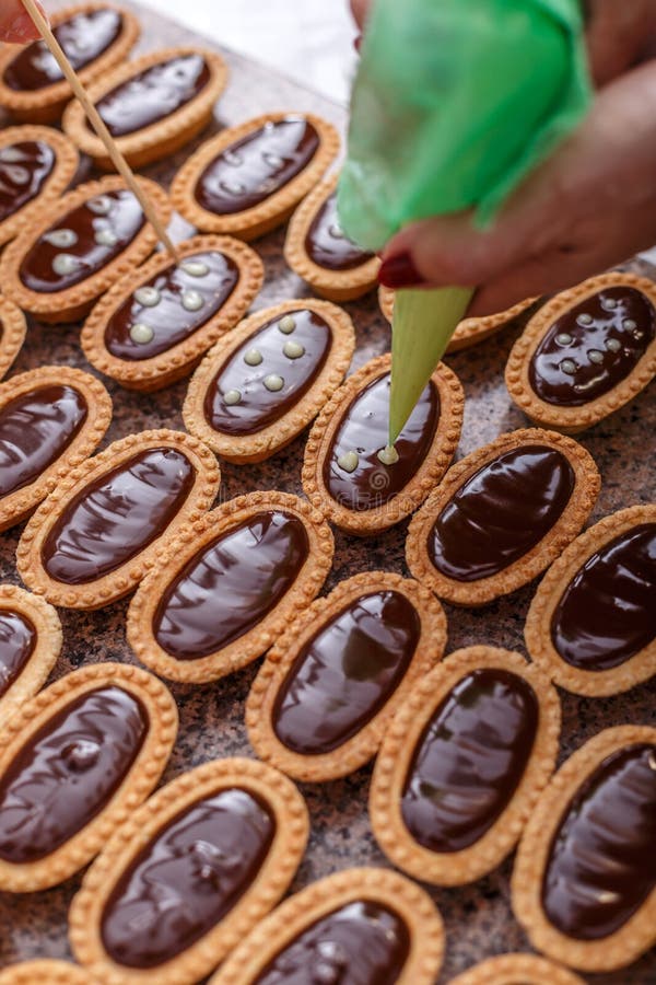 Woman Hand Decorating Mini Tarts Stock Image - Image of decorate ...