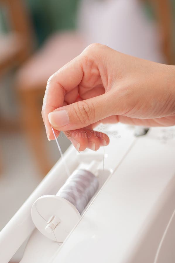 Woman hand drawn thread stock photo. Image of equipment - 64682772